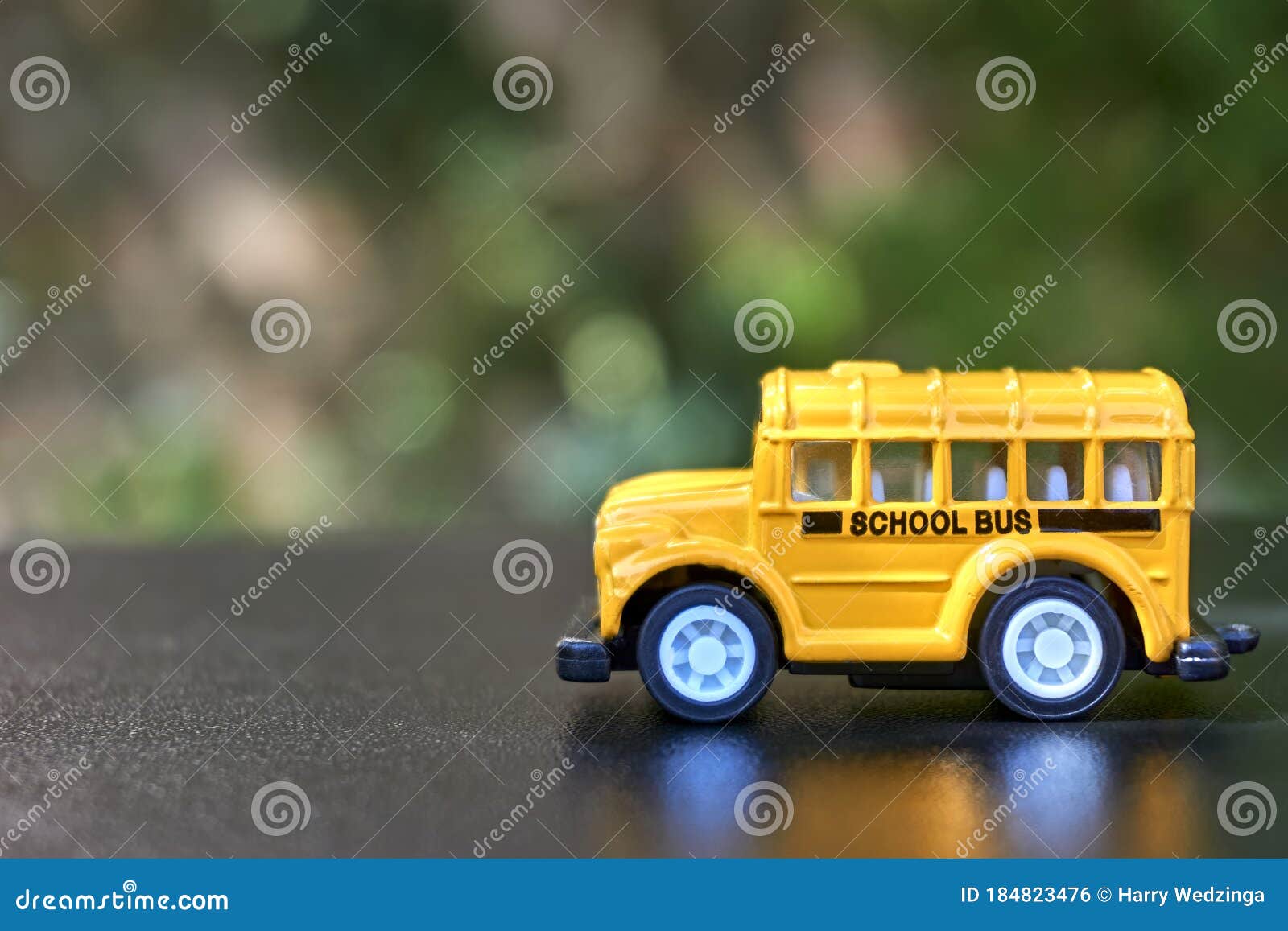 Yellow School Bus Toy Model. Stock Photo - Image of road, nature: 184823476