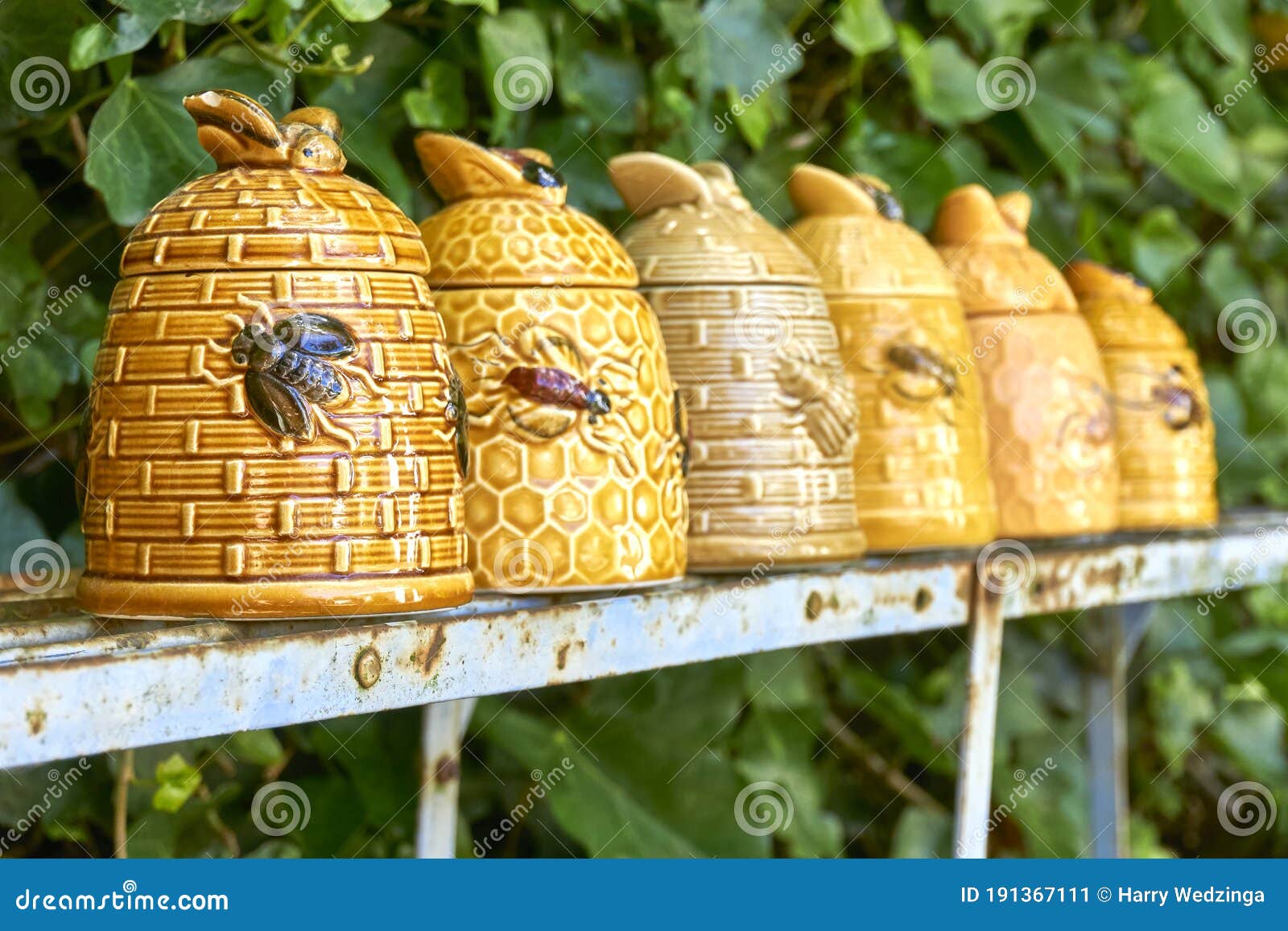 A row of vintage honeypots stock image. Image of ingredient - 191367111