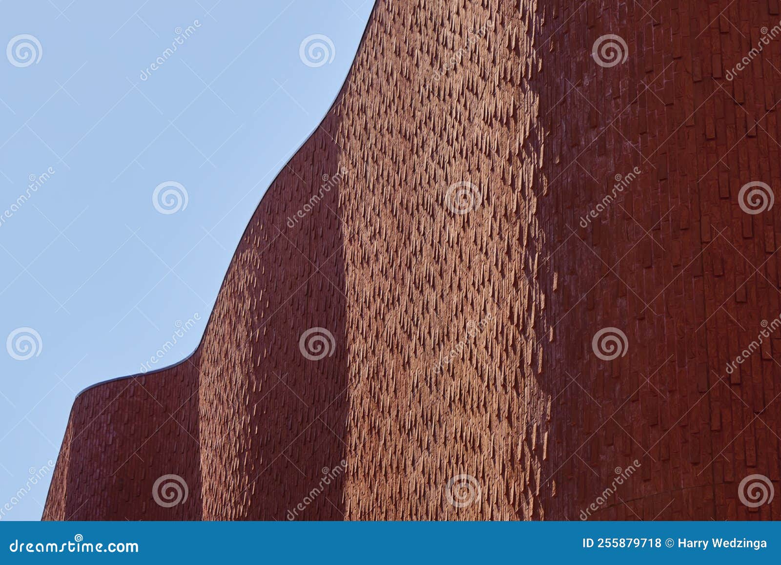 Red Brown Wavy Brick Wall of a Modern Building Stock Photo - Image of ...