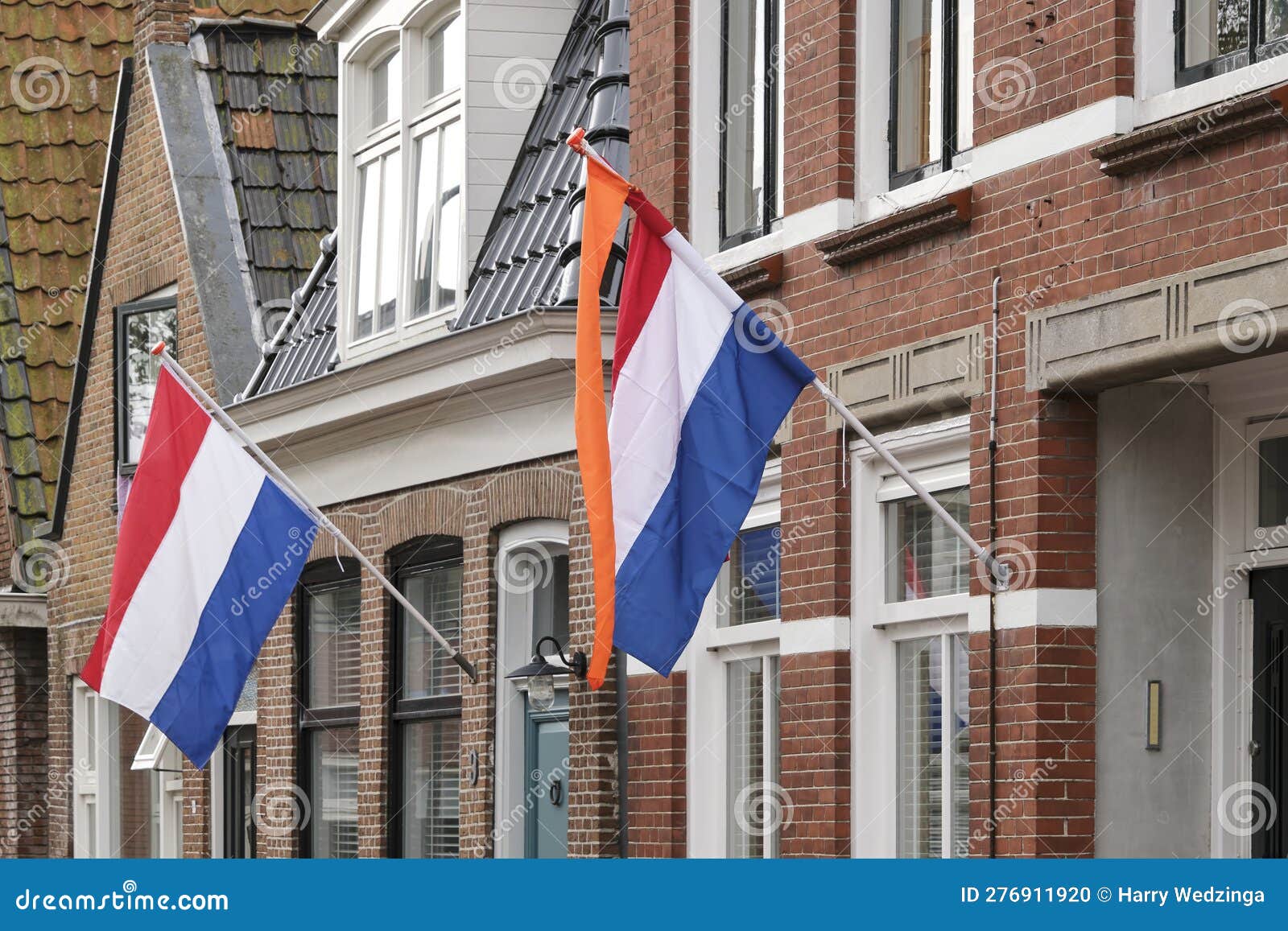 Dutch Flags Waving in a Dutch Street on Koningsdag Stock Photo - Image ...