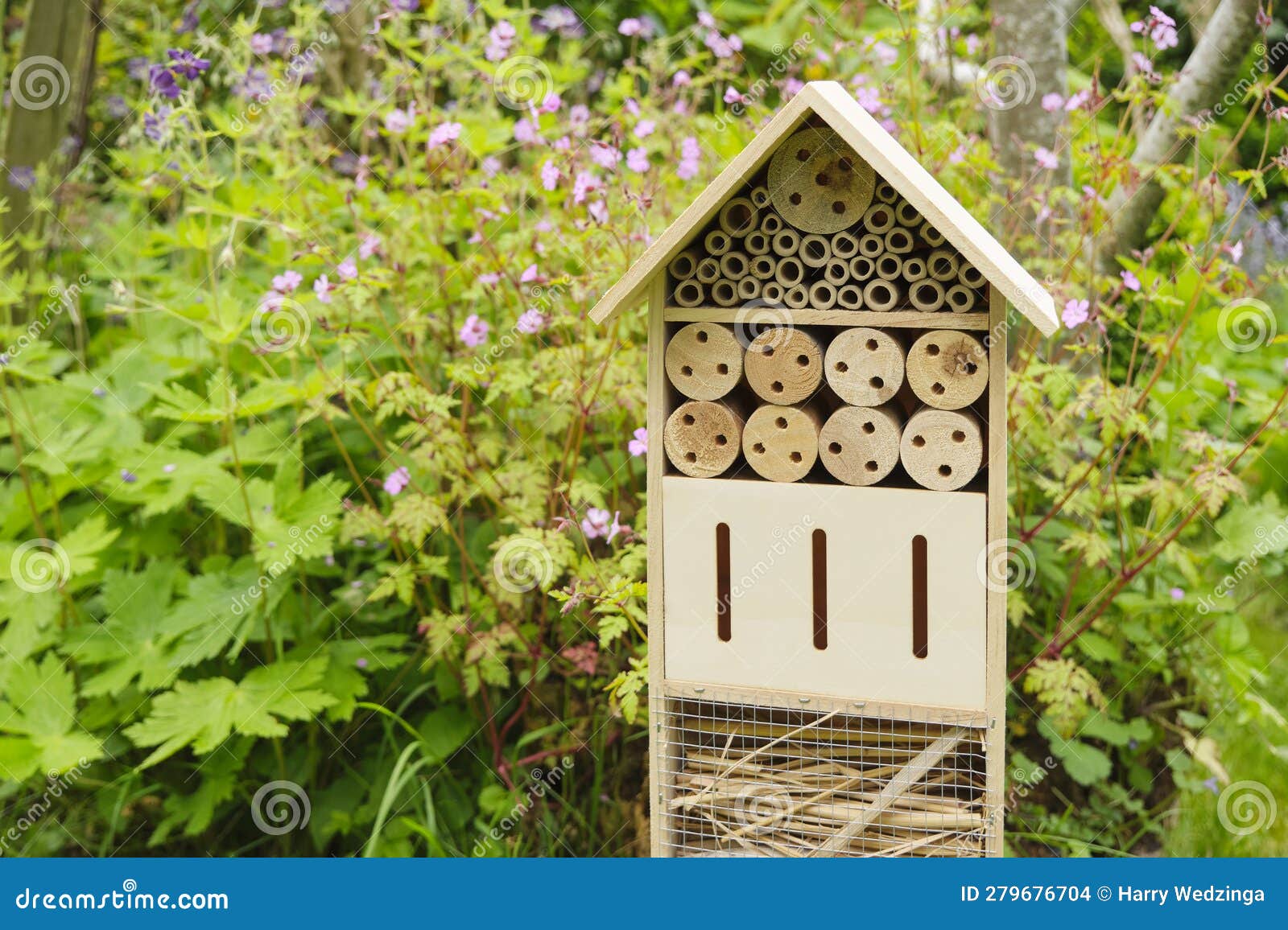 An Insect Hotel or Bee Hotel in a Summer Garden Stock Photo - Image of ...