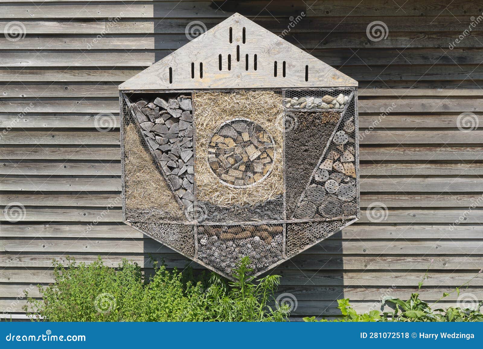 Large Insect Hotel in the Shape of a Hexagon Stock Photo - Image of ...
