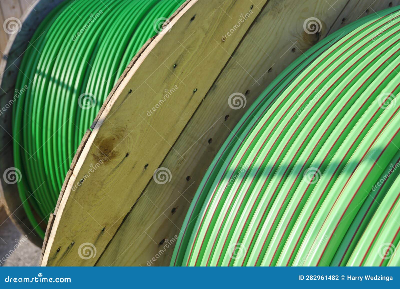 Wooden Rolls of Green Colored Industrial Tube Cable Stock Photo - Image ...