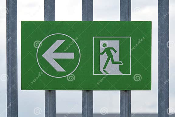 Closeup of a Green Escape Route Sign Stock Image - Image of direction ...