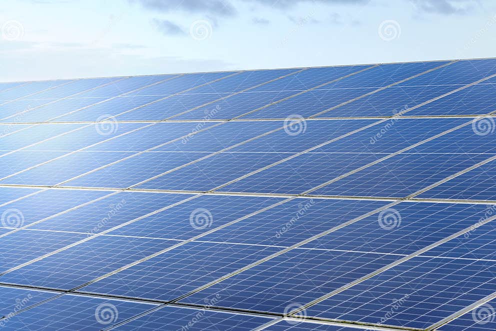 Blue Solar Cells in a Solar Panels Power Farm or Photovoltaic Cell Park ...