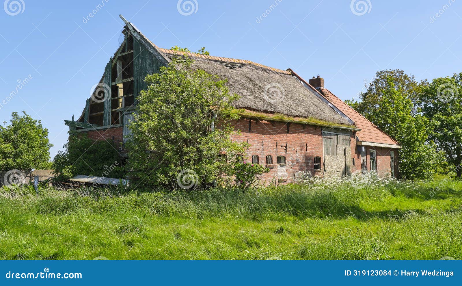 An Abandoned and Dilapidated Farm House on a Neglected Terrain Stock ...