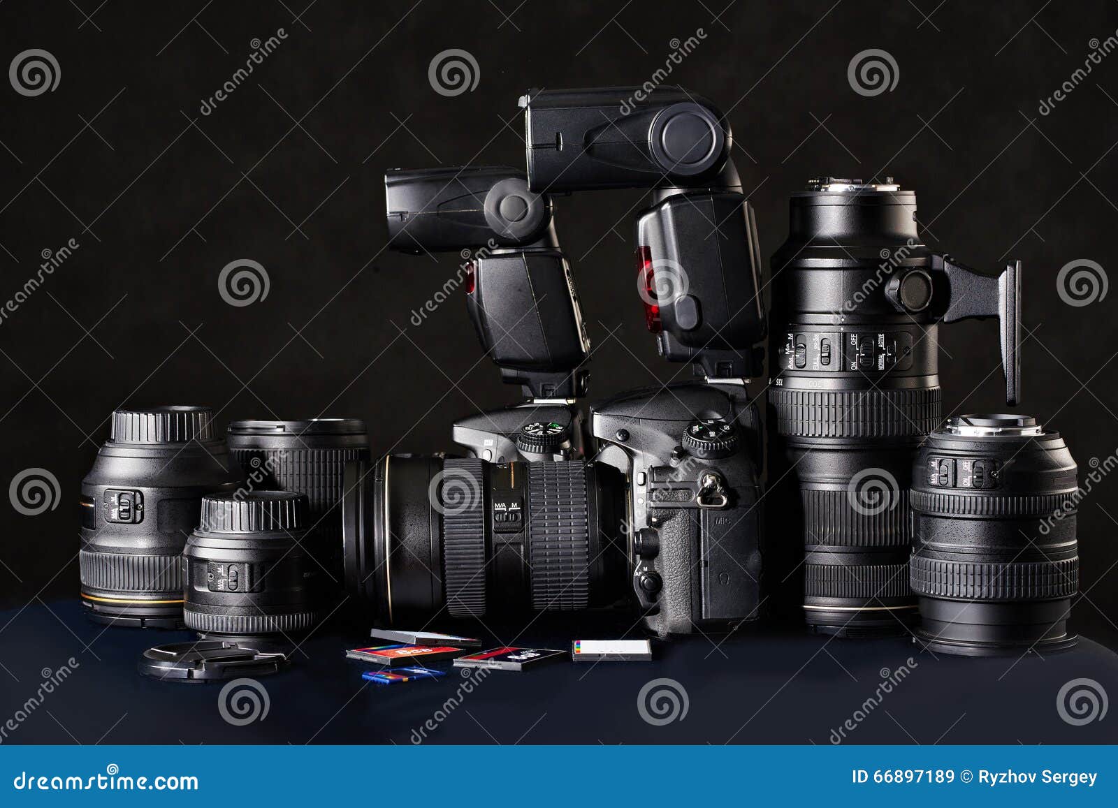 DSLR Camera, Lens and Flash Cards on Black Stock Image - Image of ...