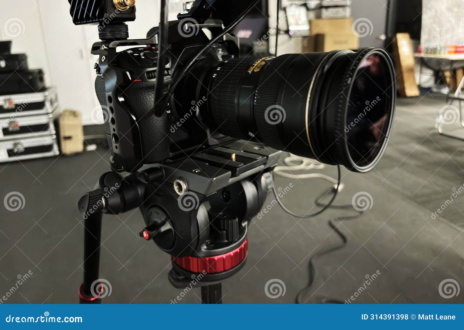 DSLR Camera with Tripod Mount and Cables at Presentation Evening Stock ...