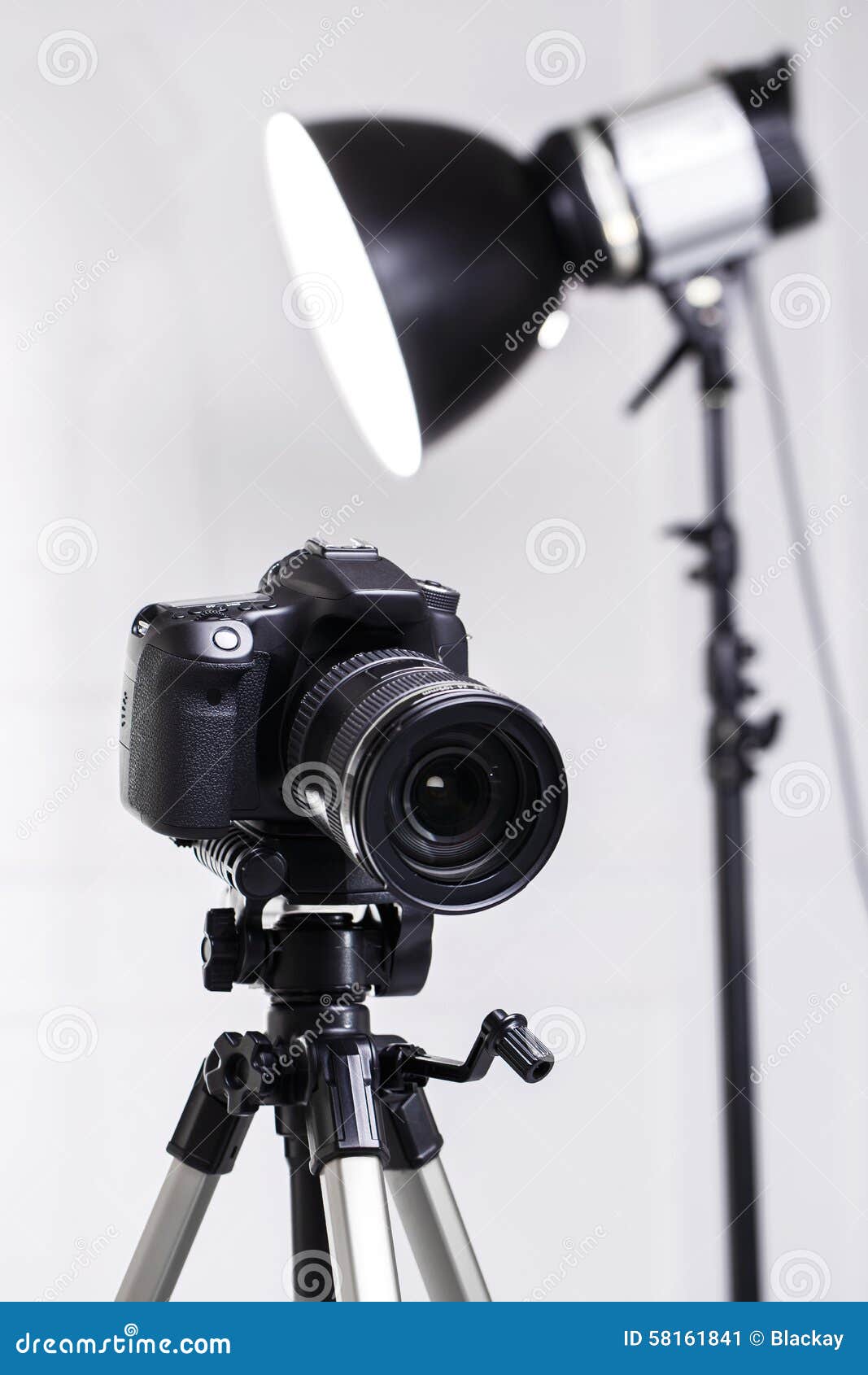 DSLR camera on tripod stock image. Image of strobe, flash - 58161841