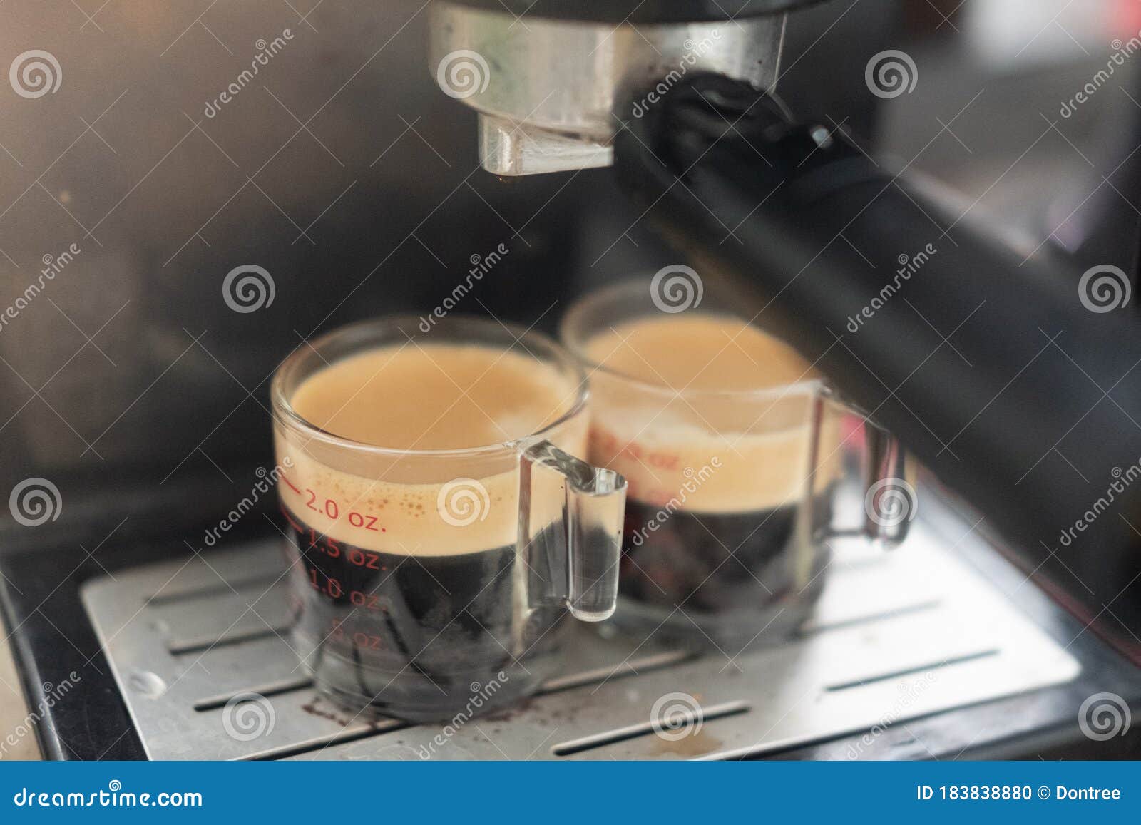 Dual Espresso Being Made from a Commercial Machine Stock Photo - Image ...