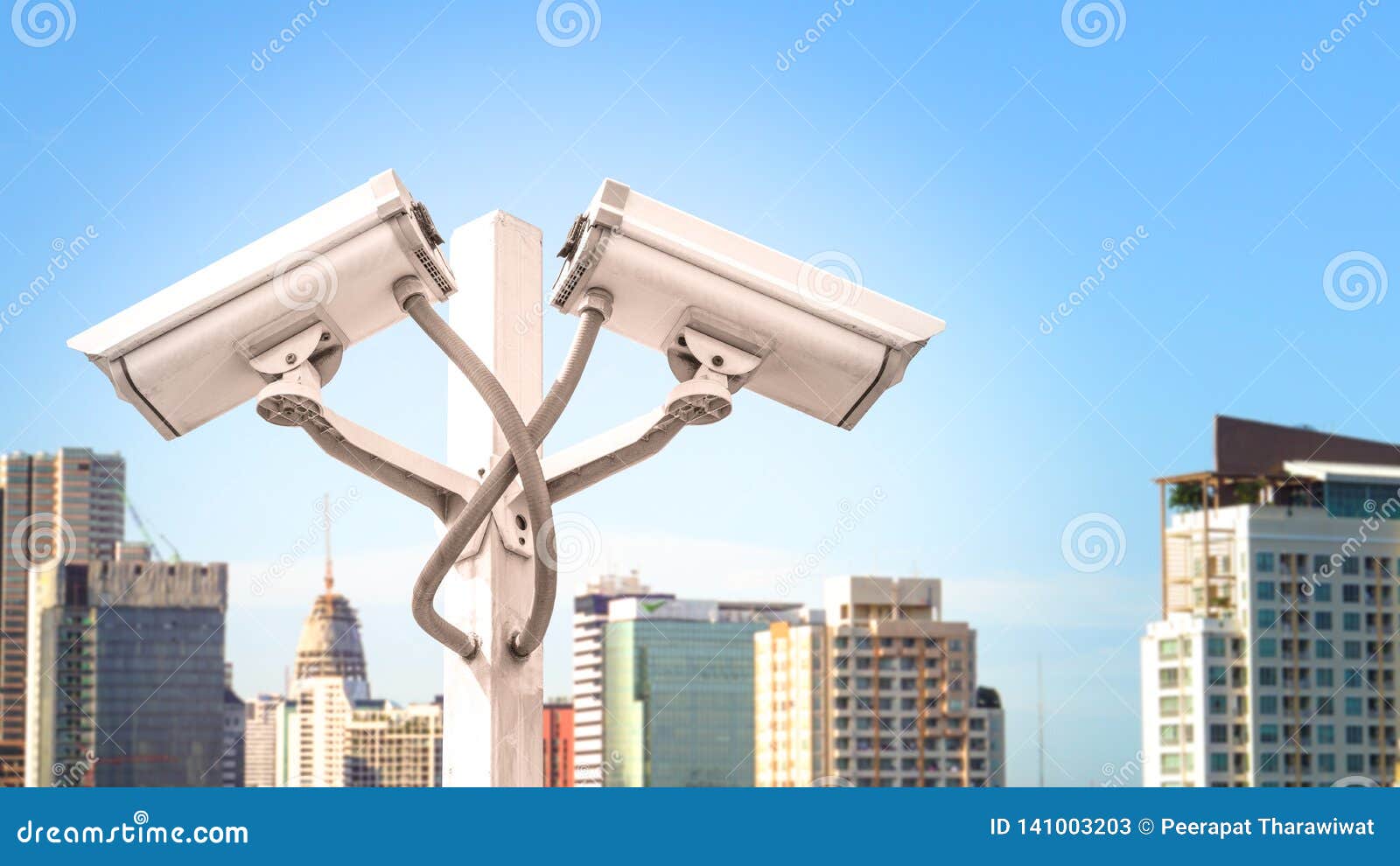 Dual Surveillance Cctv Camera on Pole in City Tower with Flare Light ...