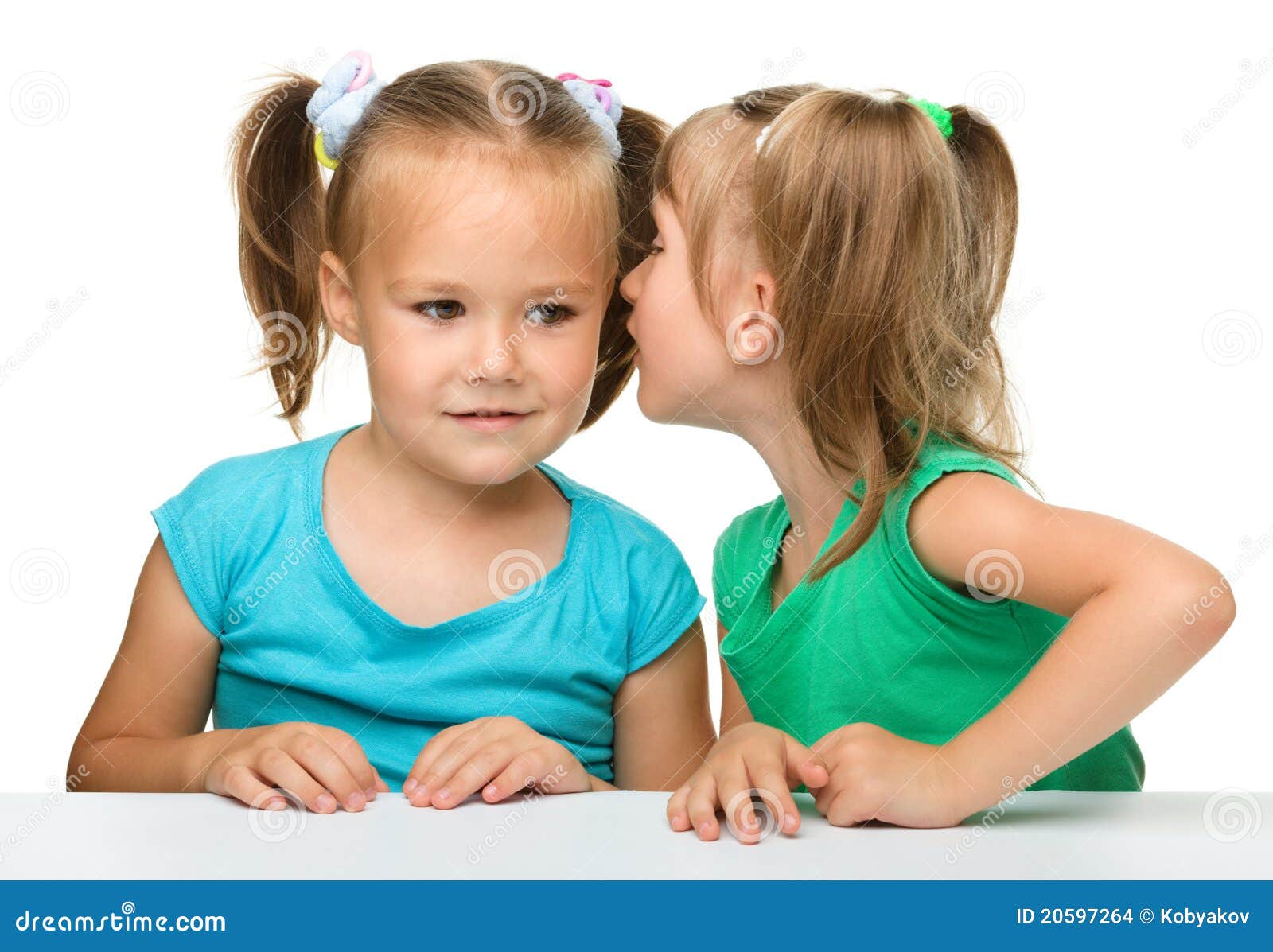 Duas Meninas Estão Conversando Foto de Stock - Imagem de horizontal ...