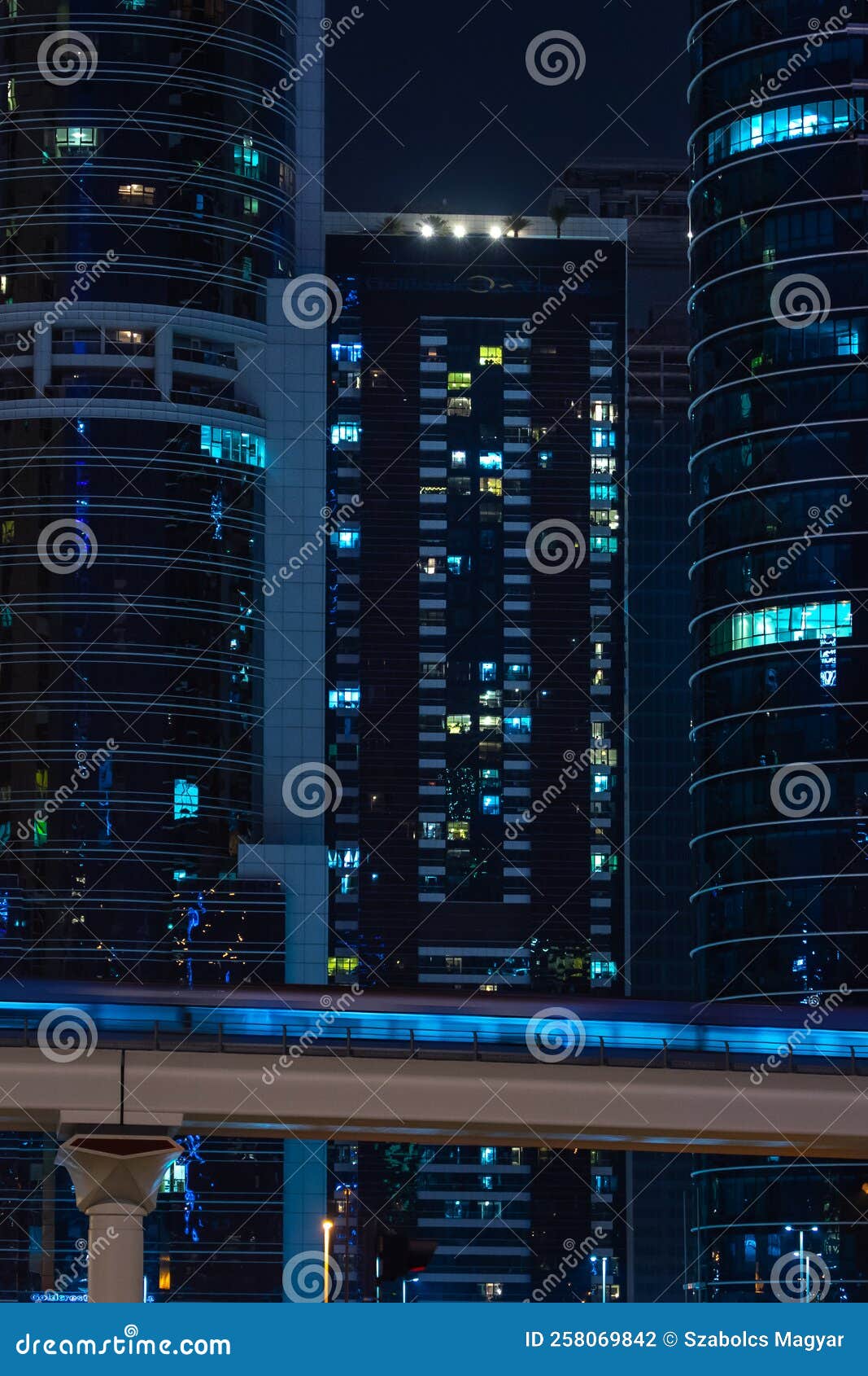 Dubai Metro Moving in Front of Skyscrapers with Motion Blur Editorial ...