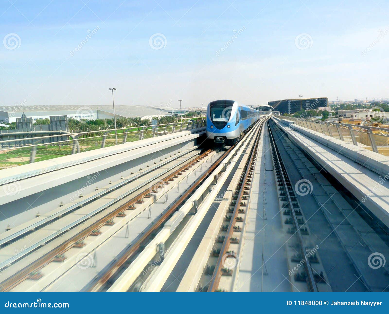 Dubai Metro Train On Rails At Background Of Skyscrapers. Famous Outdoor ...