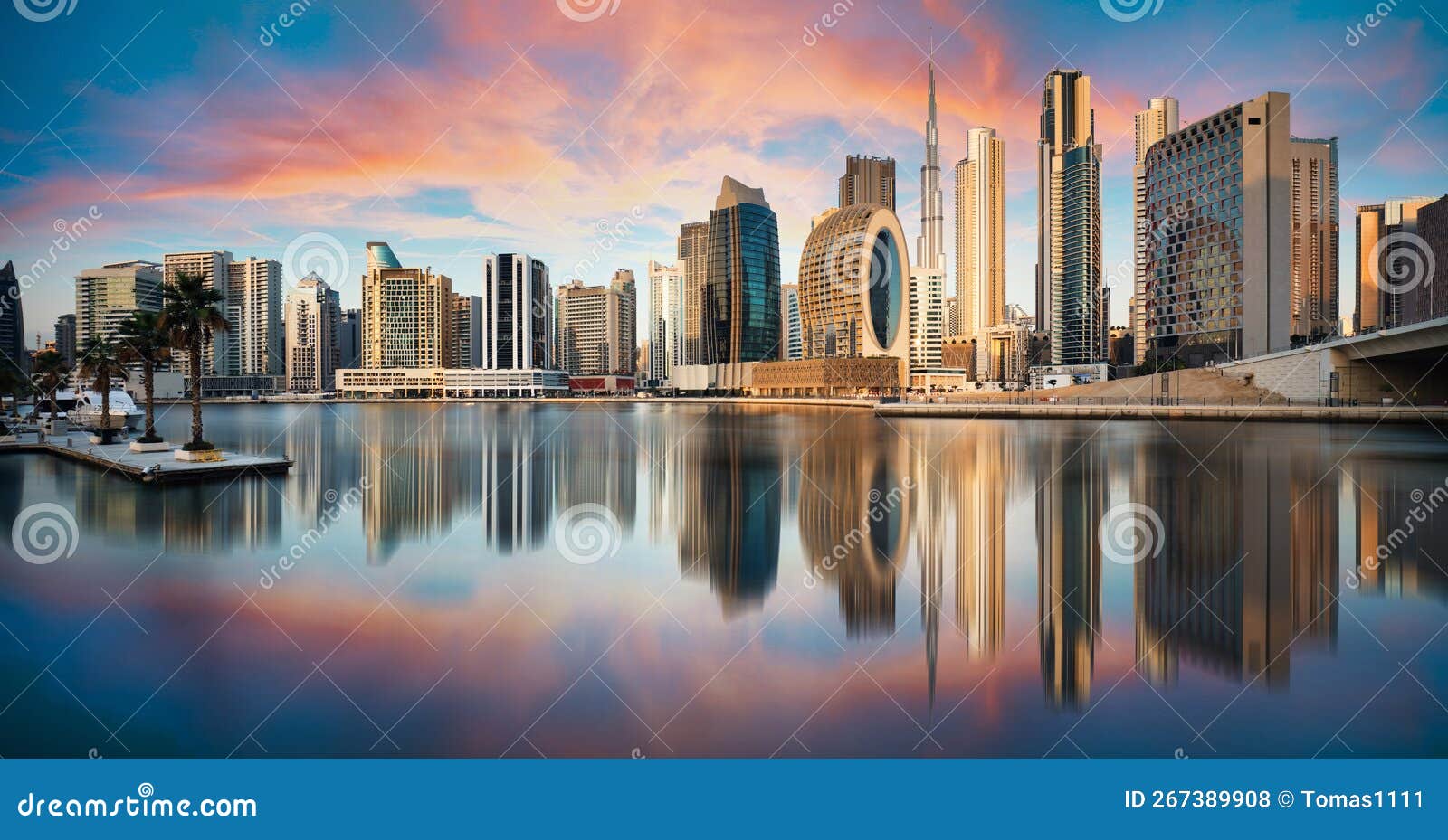 Dubai Skyline with Reflection at Dramatic Sunset, UAE Stock Photo ...