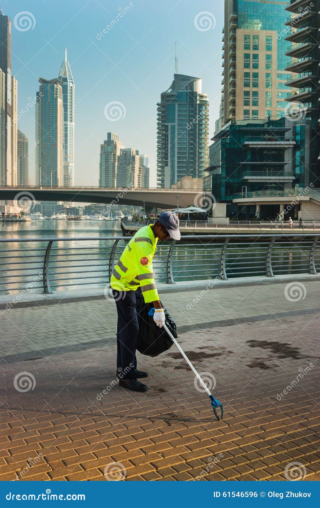 Dubai street cleaner editorial photo. Image of male, person - 61546596