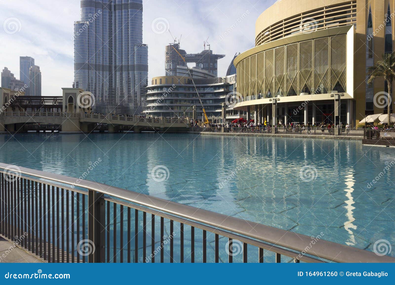 External Artificial Pool of Dubai Mall with Burj Khalifa Building in ...