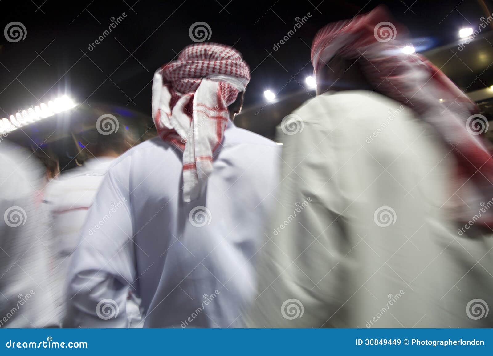 Dubai UAE Small Group Of Traditionally Dressed Muslim Men Roaming ...
