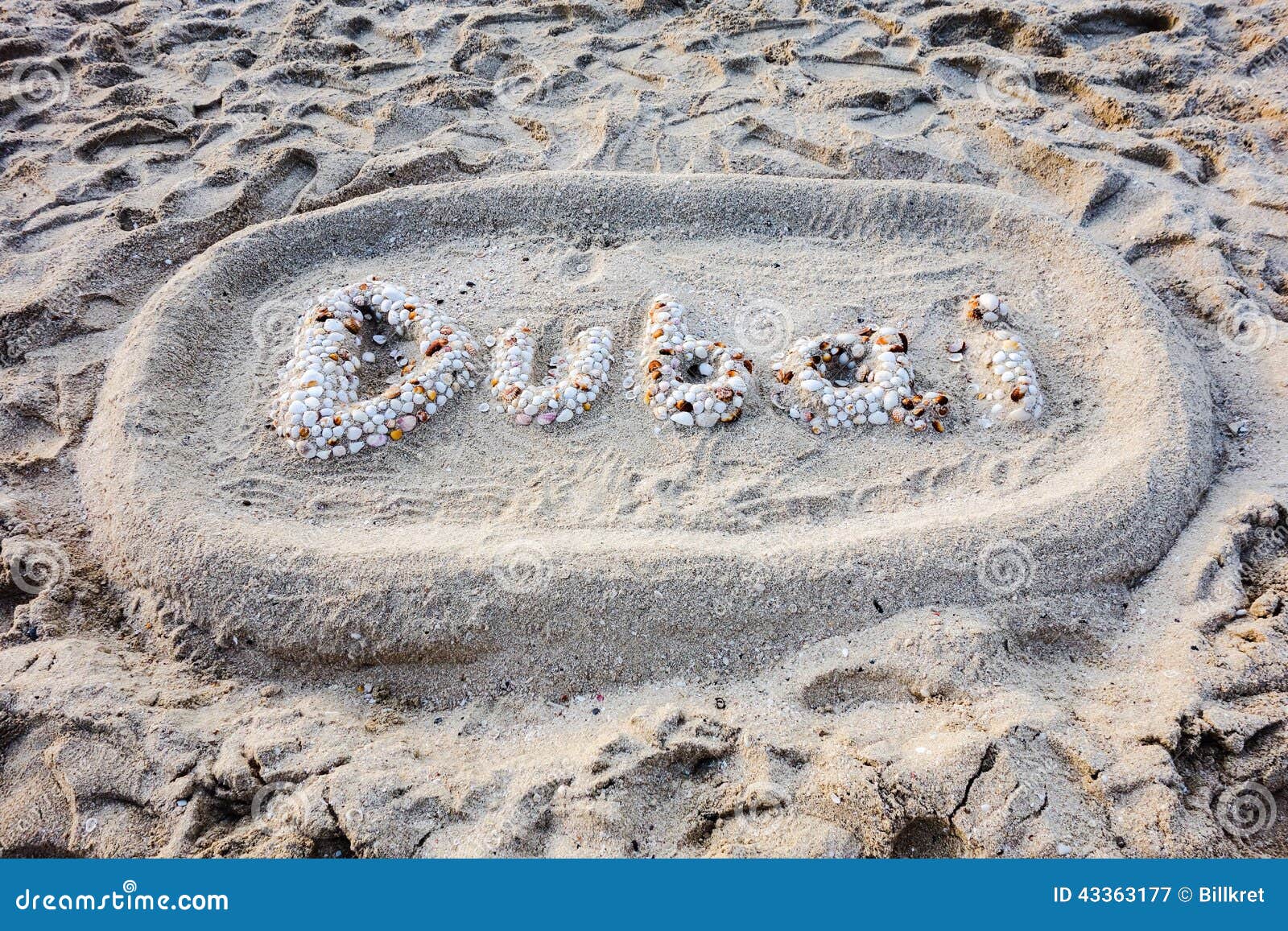 Dubai, Written with Shells in Desert Sand Stock Image - Image of sand ...