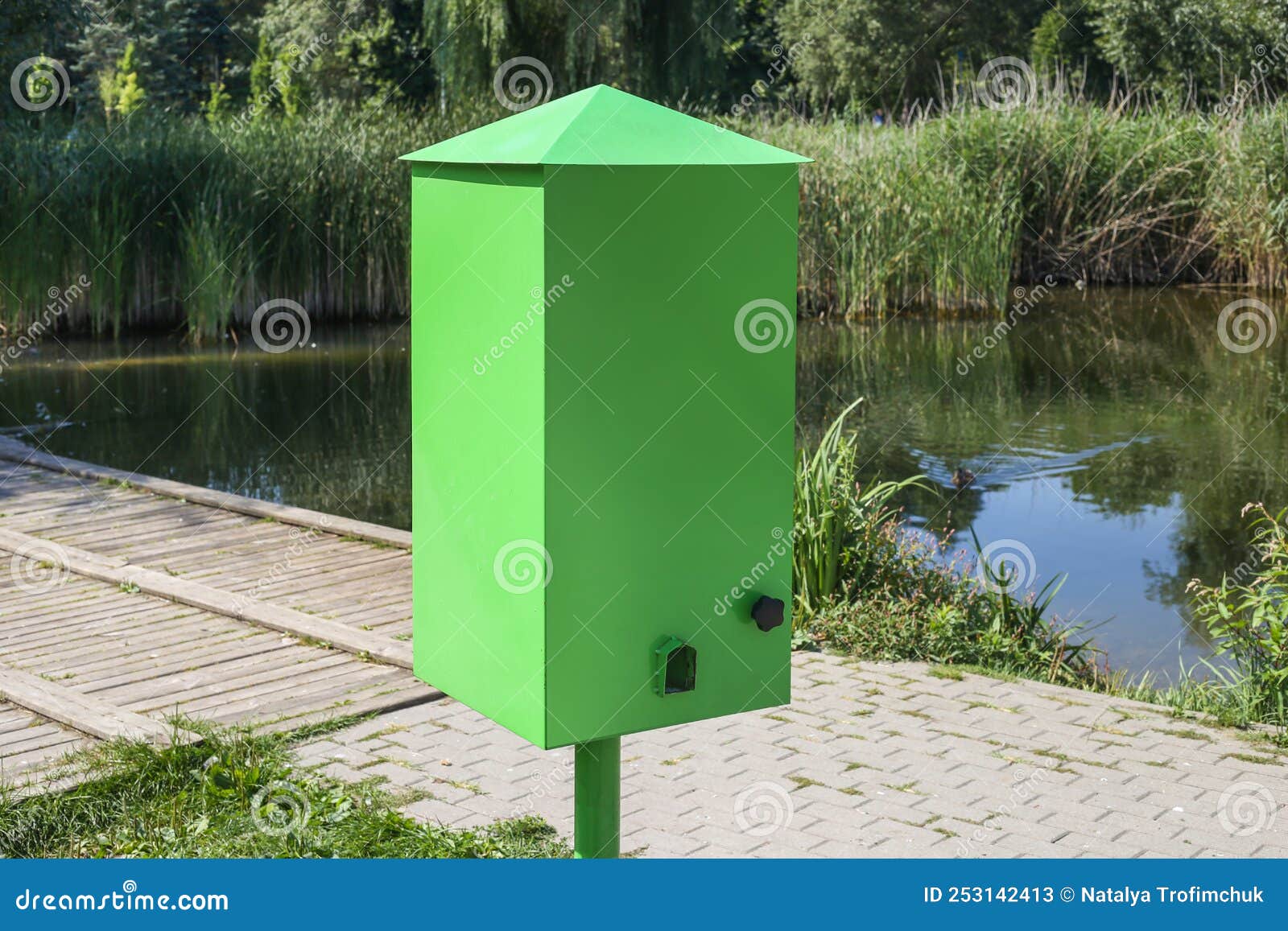 Duck feed machine in park stock image. Image of machine - 253142413