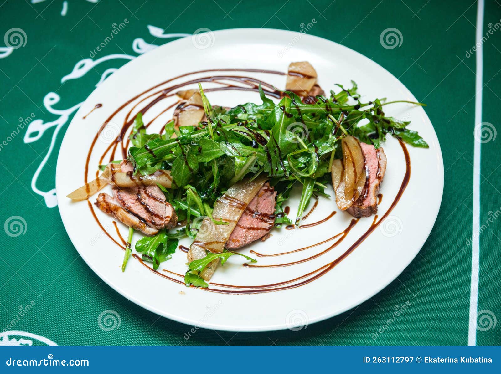 Duck Fillet Sous Vide with Fresh Arugula and Drunken Pear Stock Image ...