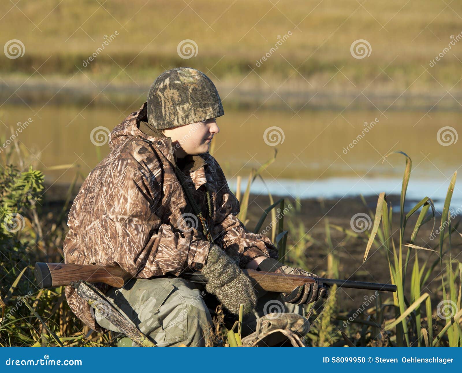 Duck Hunter stock photo. Image of youth, shotgun, waterfowl - 58099950