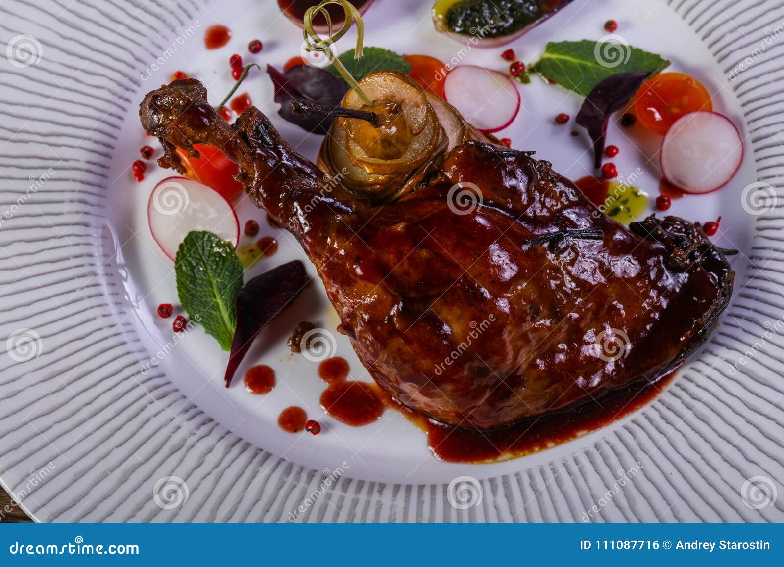 Duck leg with pear stock photo. Image of sauce, dish - 111087716