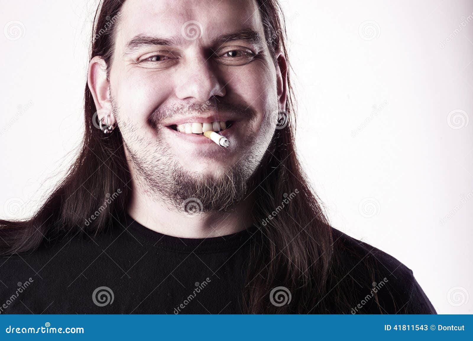 Dude with Flowing Hair Smiling and Smoking Stock Image - Image of ...