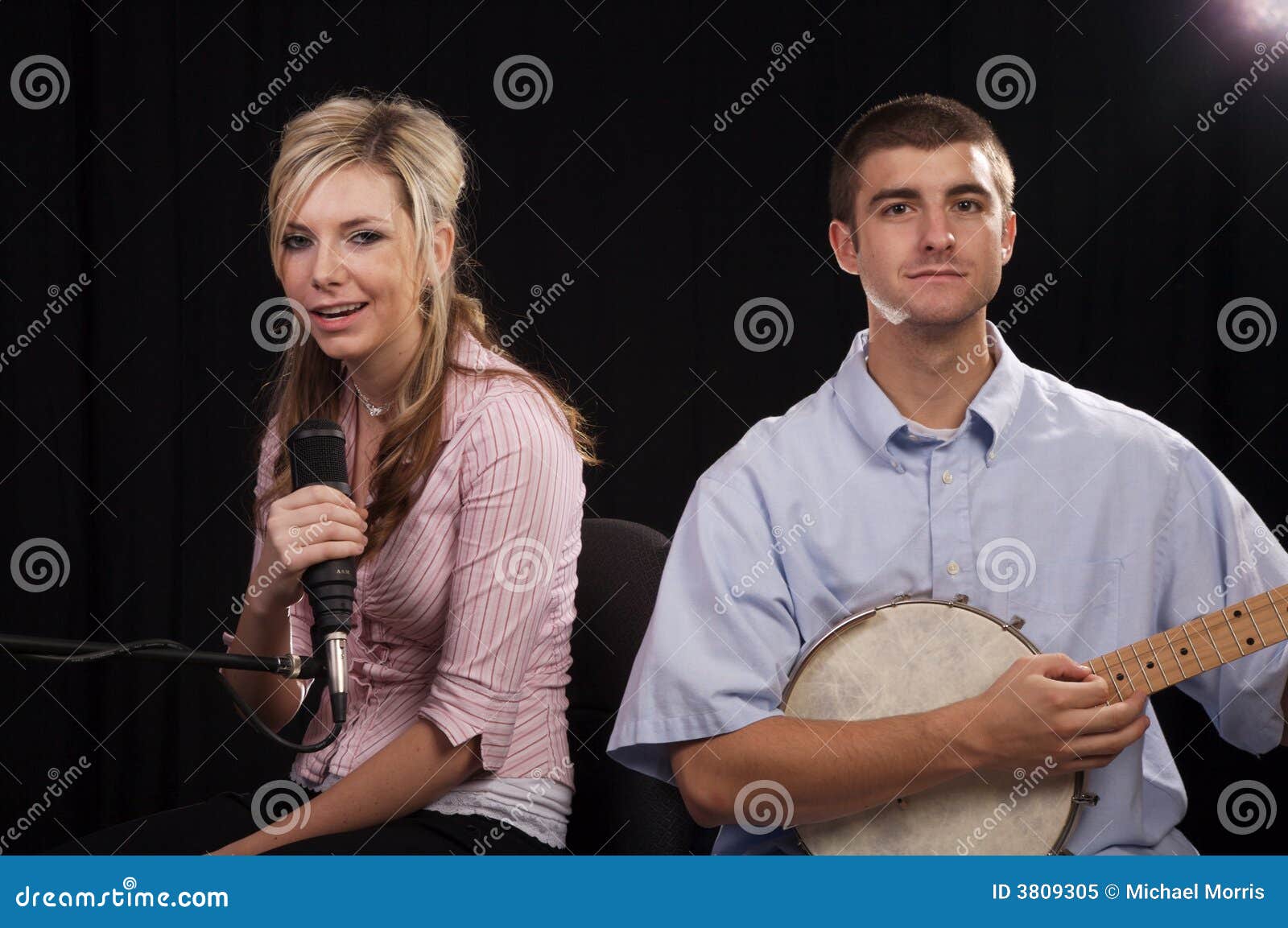 Duet stock image. Image of blond, sing, smile, music, woman - 3809305