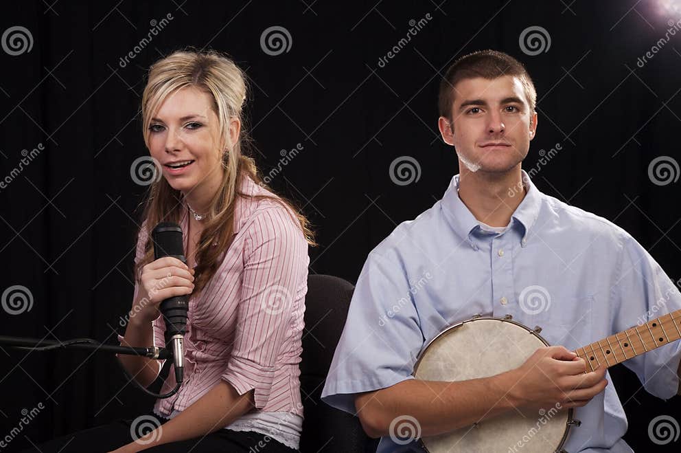 Duet stock image. Image of blond, sing, smile, music, woman - 3809305