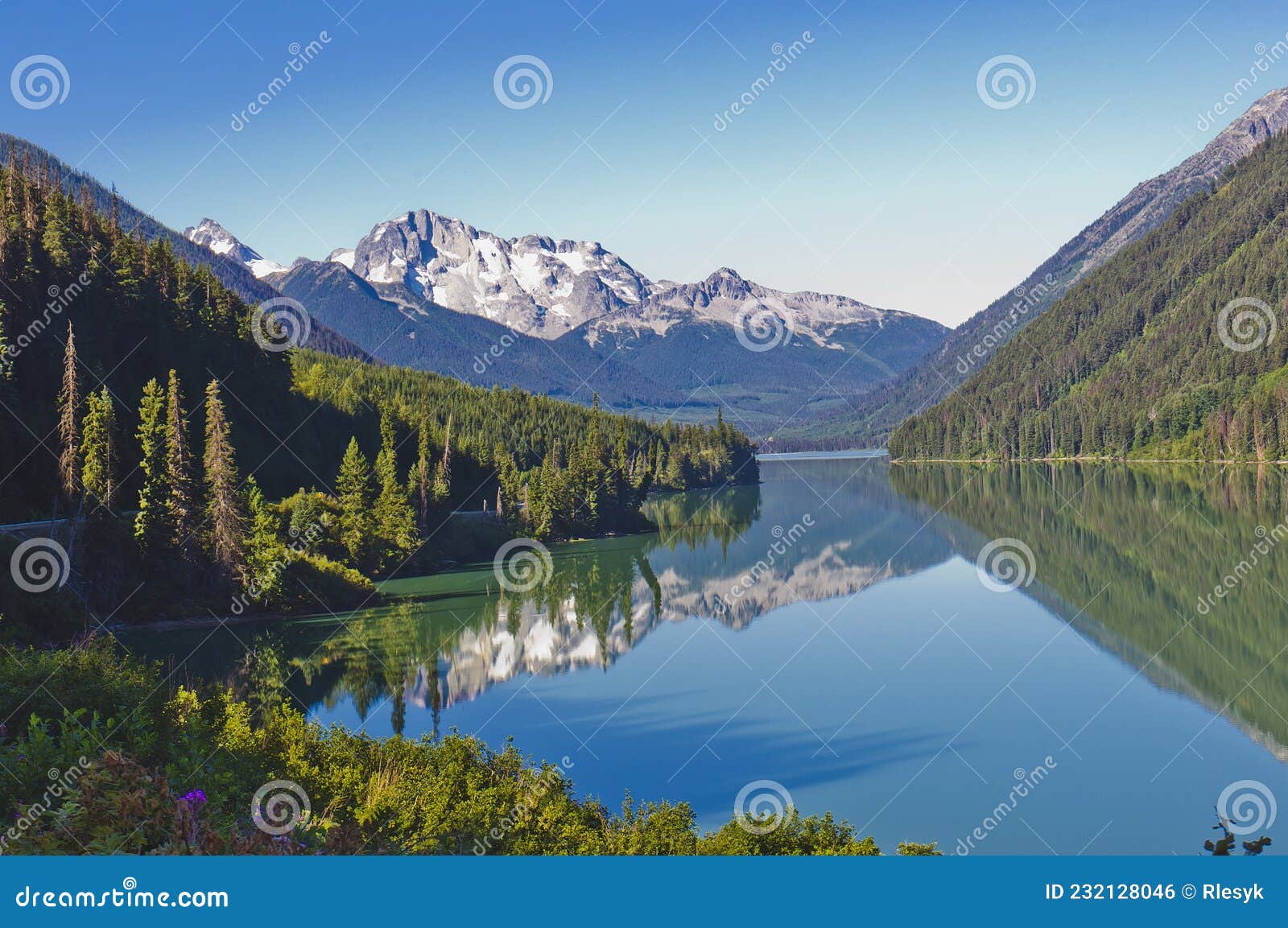 Duffey Lake Reflecting Mountains and Snow Stock Photo - Image of mirror ...