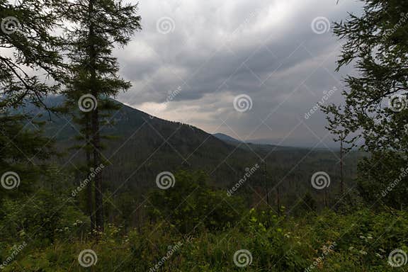 Dull sky in mountains stock image. Image of landscape - 76855989
