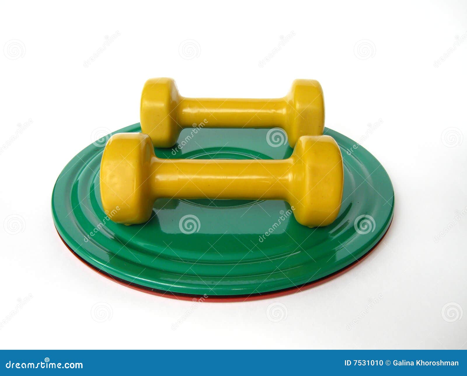 Dumbbells and the Roll Disk Stock Photo - Image of lift, equipment: 7531010
