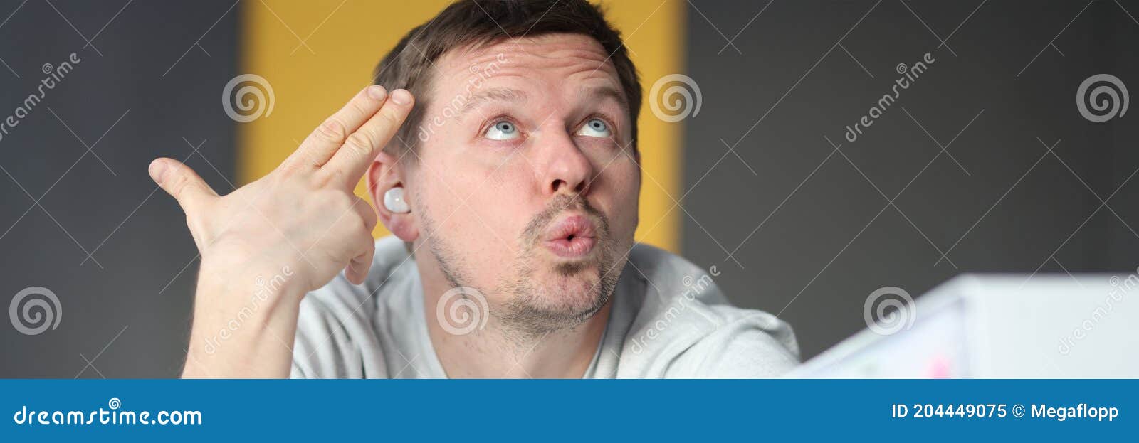 Dumbfounded Man Looks Up Next To Folder with Documents Stock Image ...