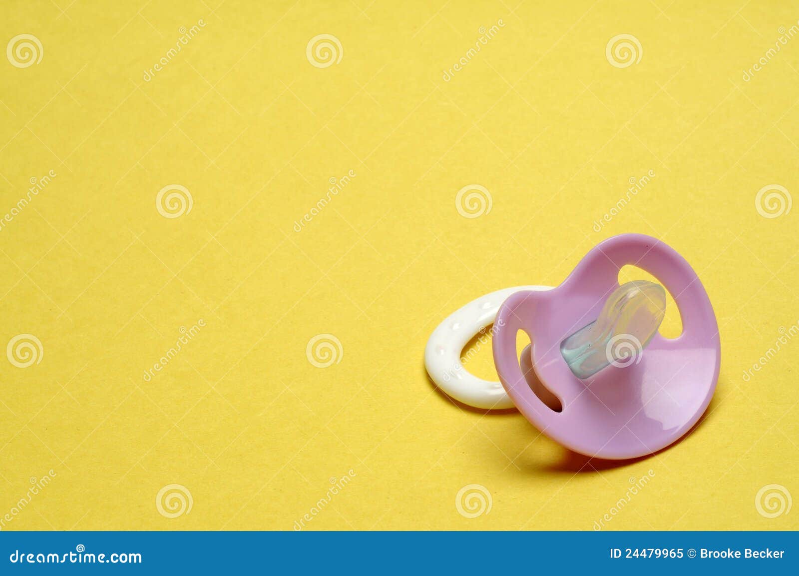 Dummy Pacifier on Yellow Background Stock Image - Image of dummy ...