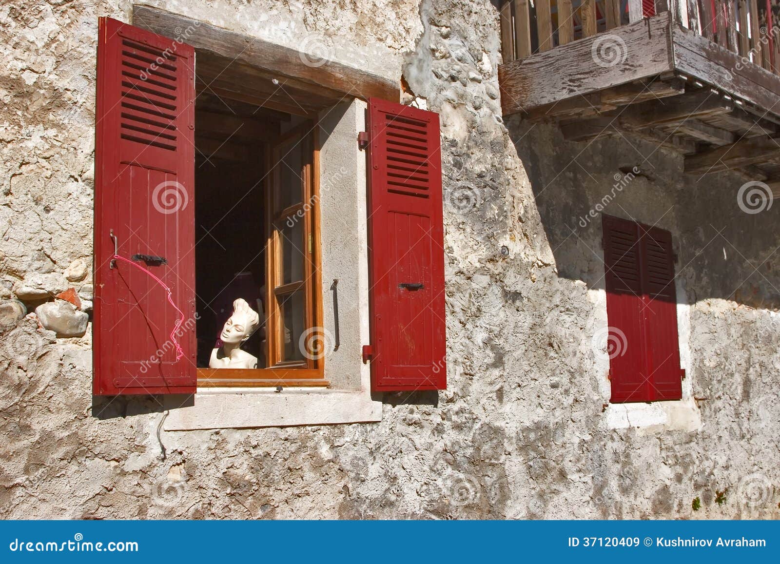 Dummy in a red window. stock image. Image of brick, european - 37120409