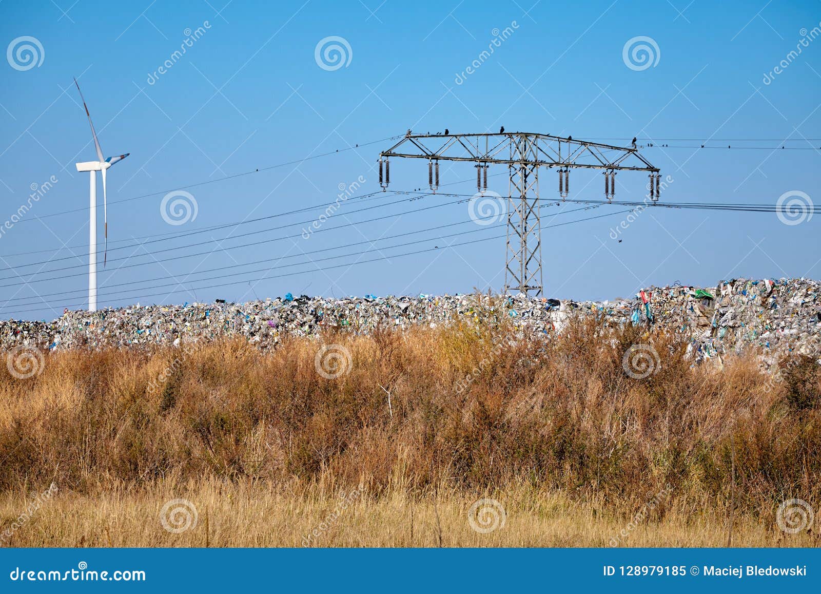 Dump Site with a Windmill in Background. Stock Image - Image of site ...