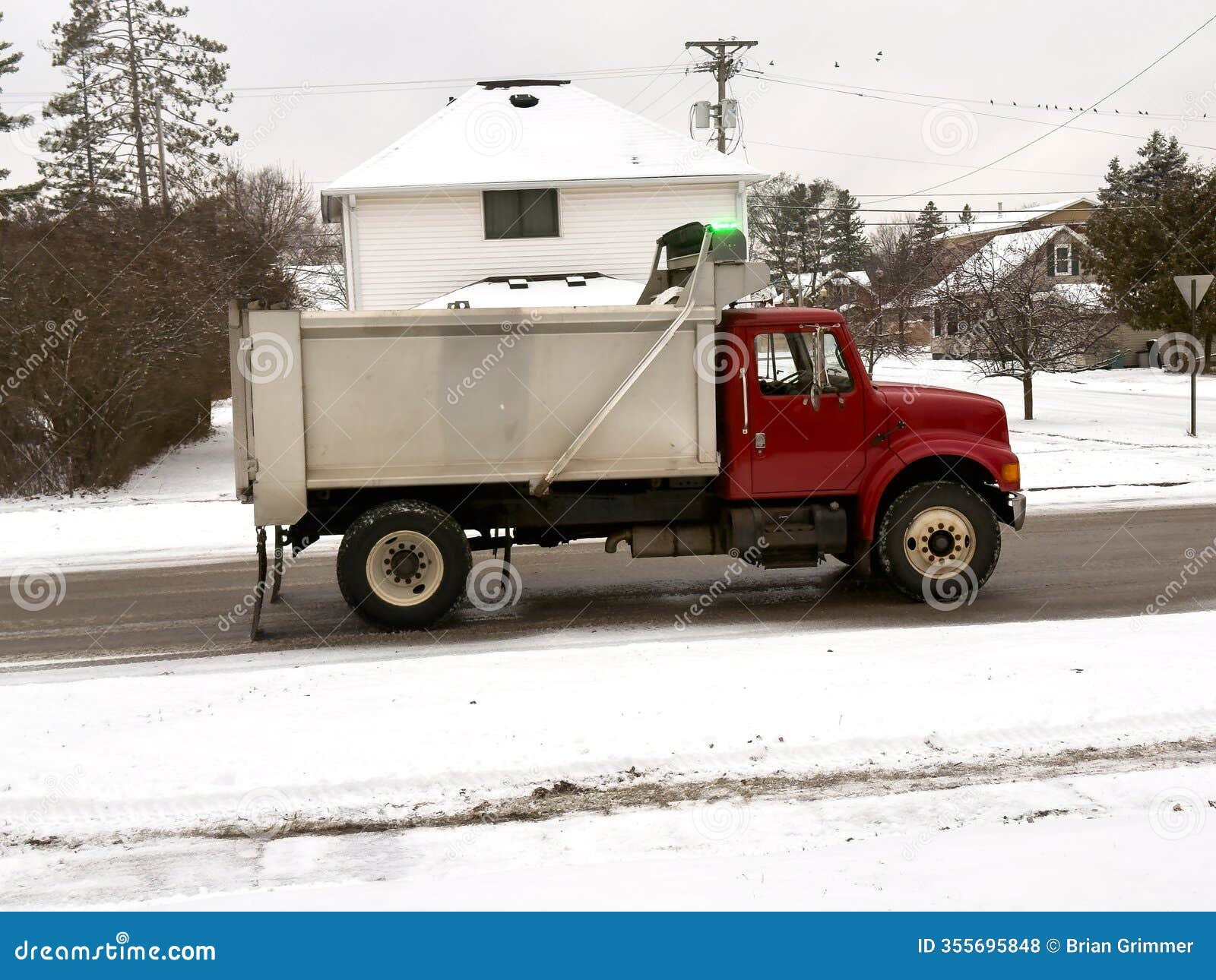 A Dump Truck in the City on a Winter Day Stock Photo - Image of vehicle ...