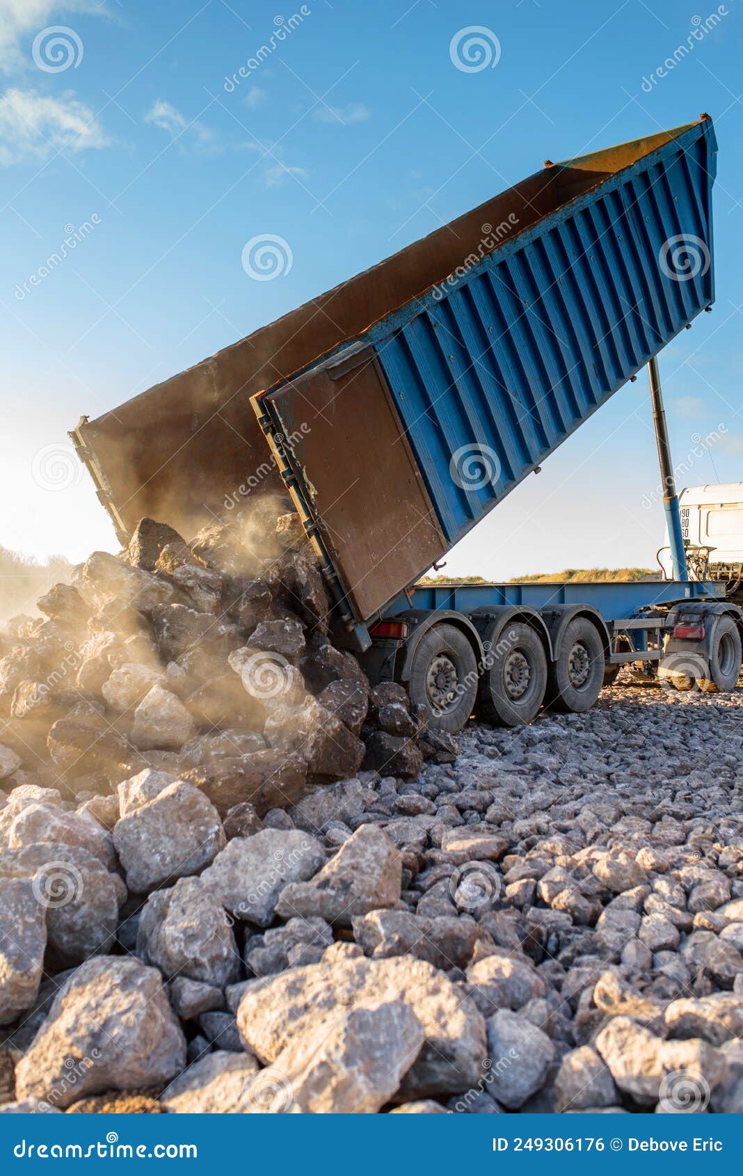 Dump Truck Unloading Its Cargo on a Construction Site Editorial Photo ...