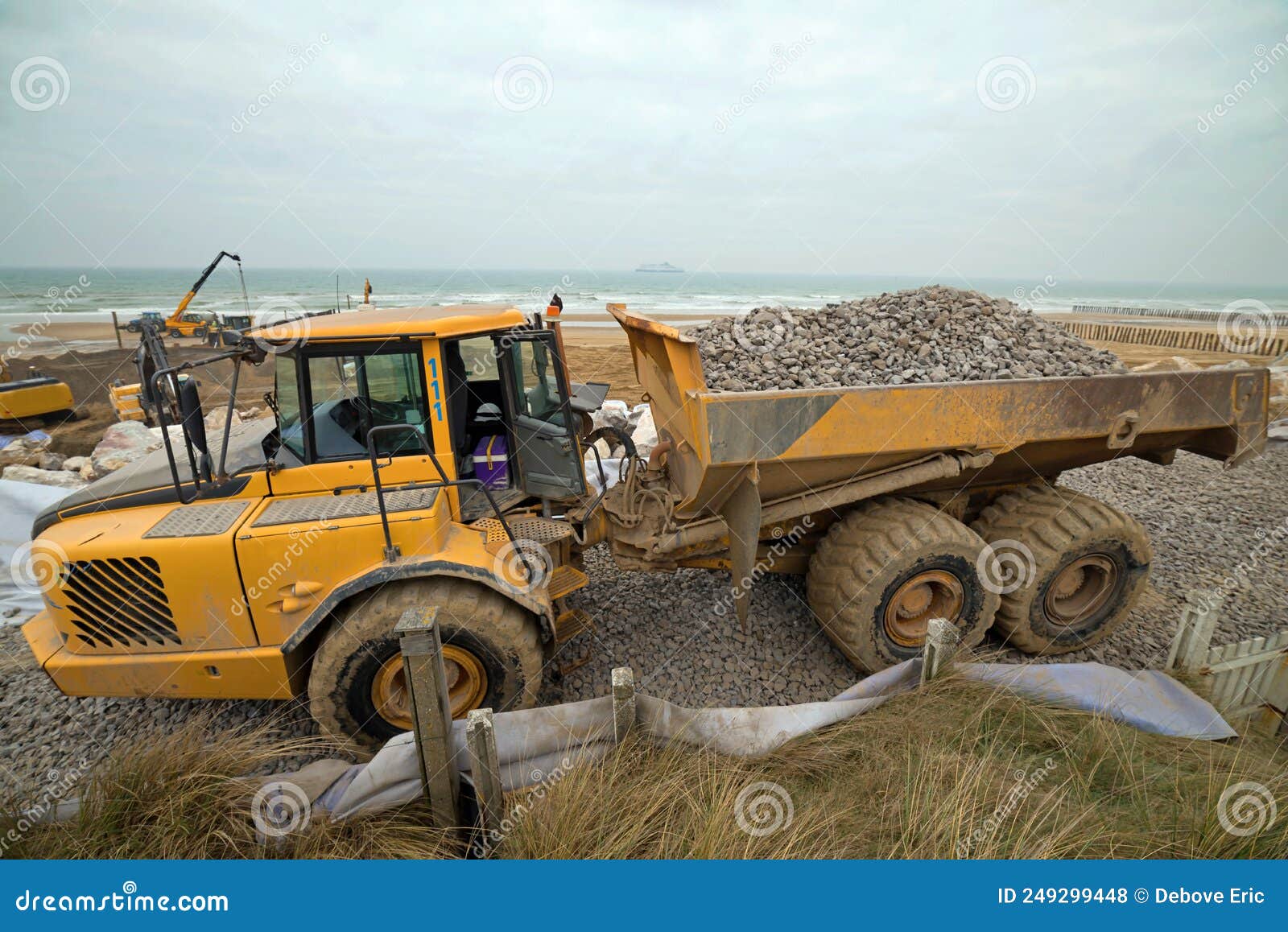 Dumper Unloading Its Cargo on a Construction Site Stock Photo - Image ...