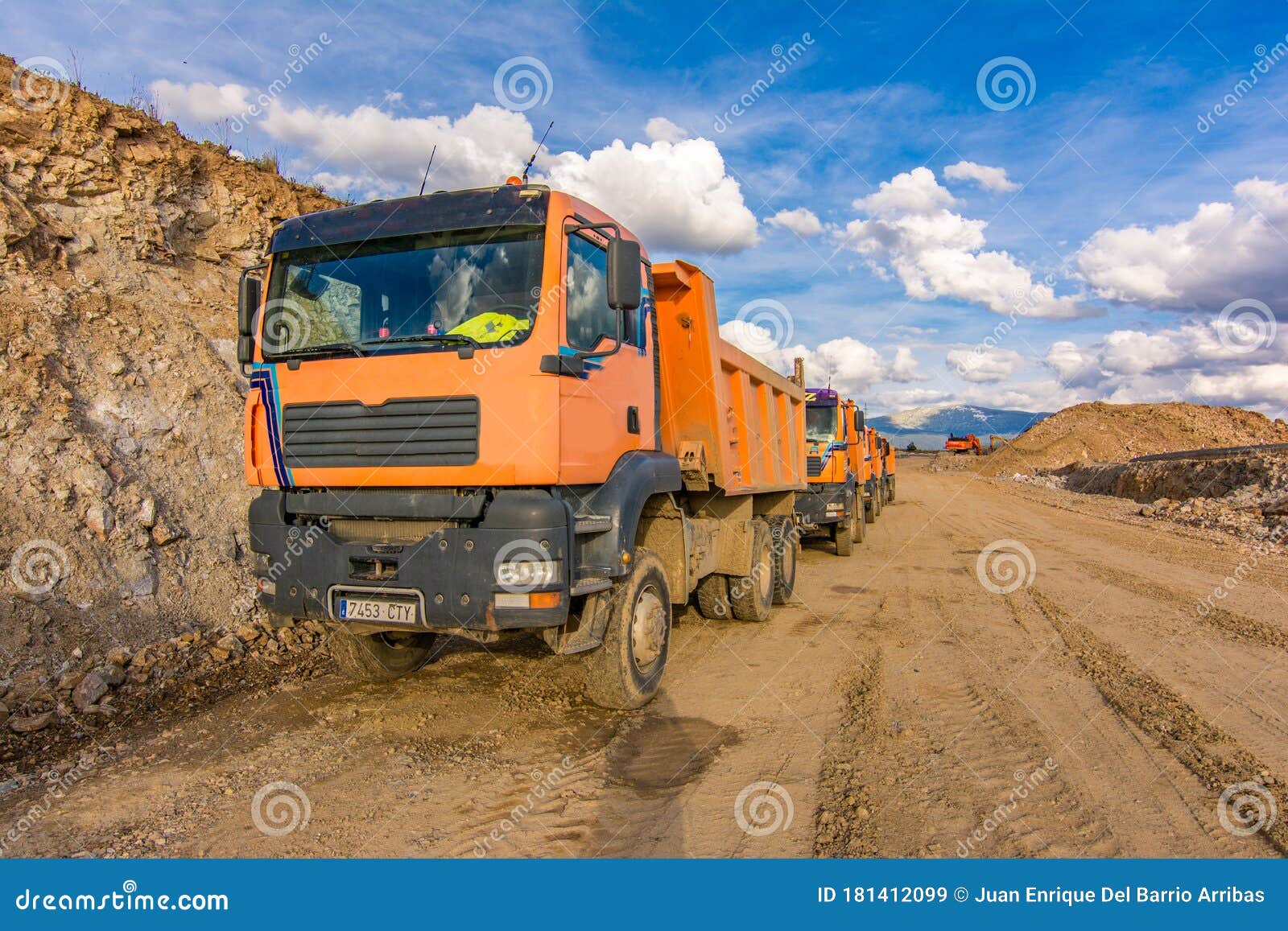 Dump Truck Fleet in a Stone and Rock Transport Mine Stock Image - Image ...