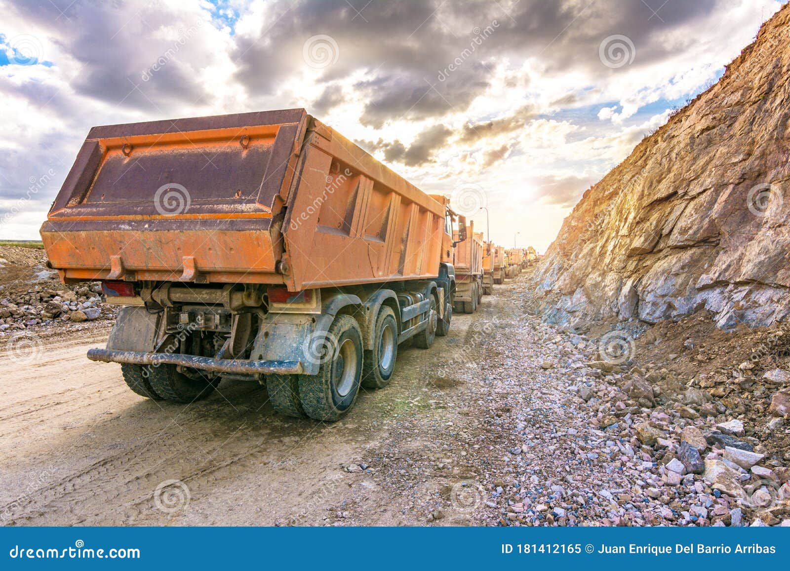 Dump Truck Fleet in a Stone and Rock Transport Mine Stock Image - Image ...