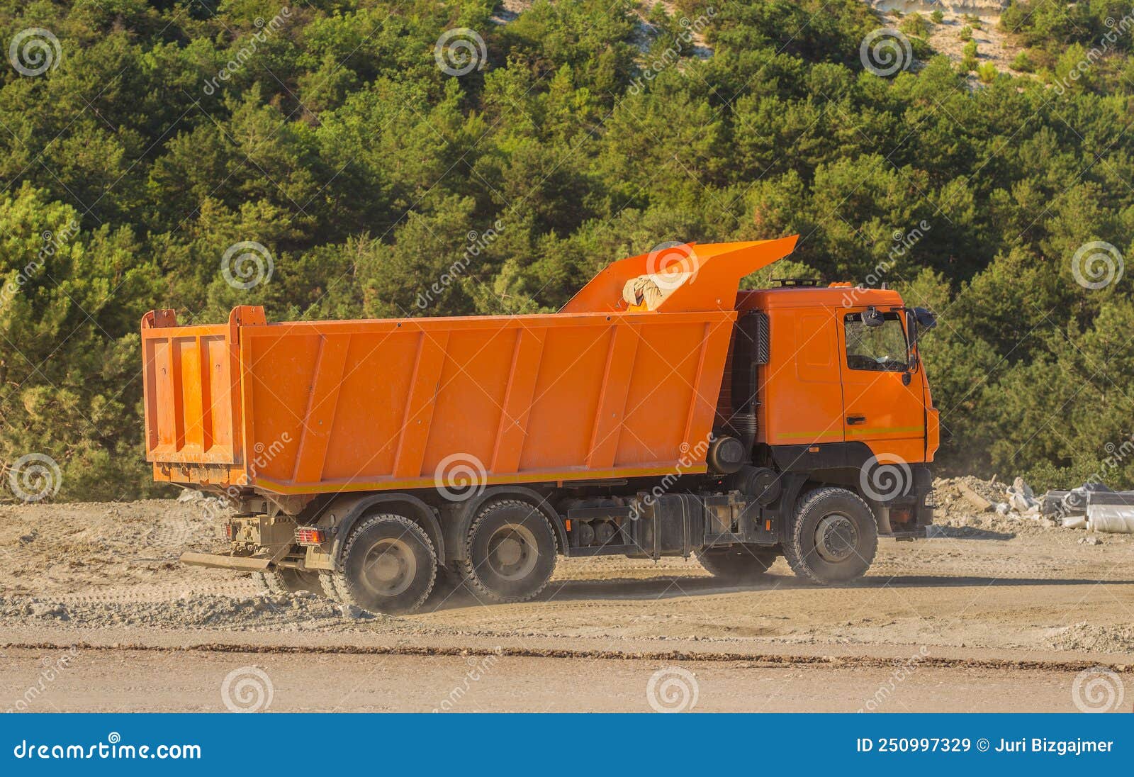 Dump truck at road stock image. Image of dumper, activity - 250997329