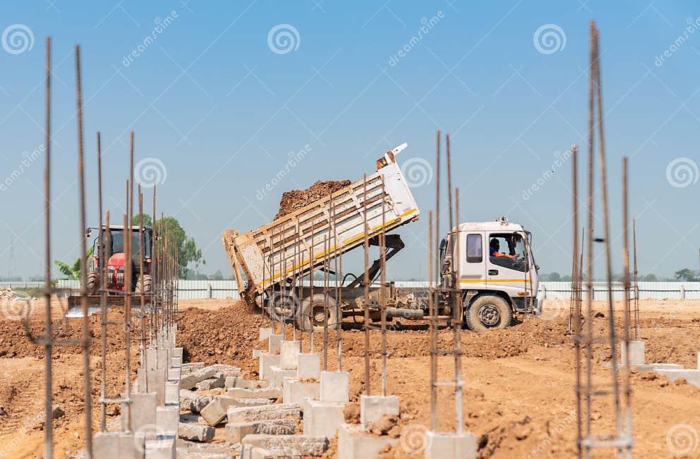 Dump Truck Unloads Soil for the Construction of Foundation Pile Cap ...