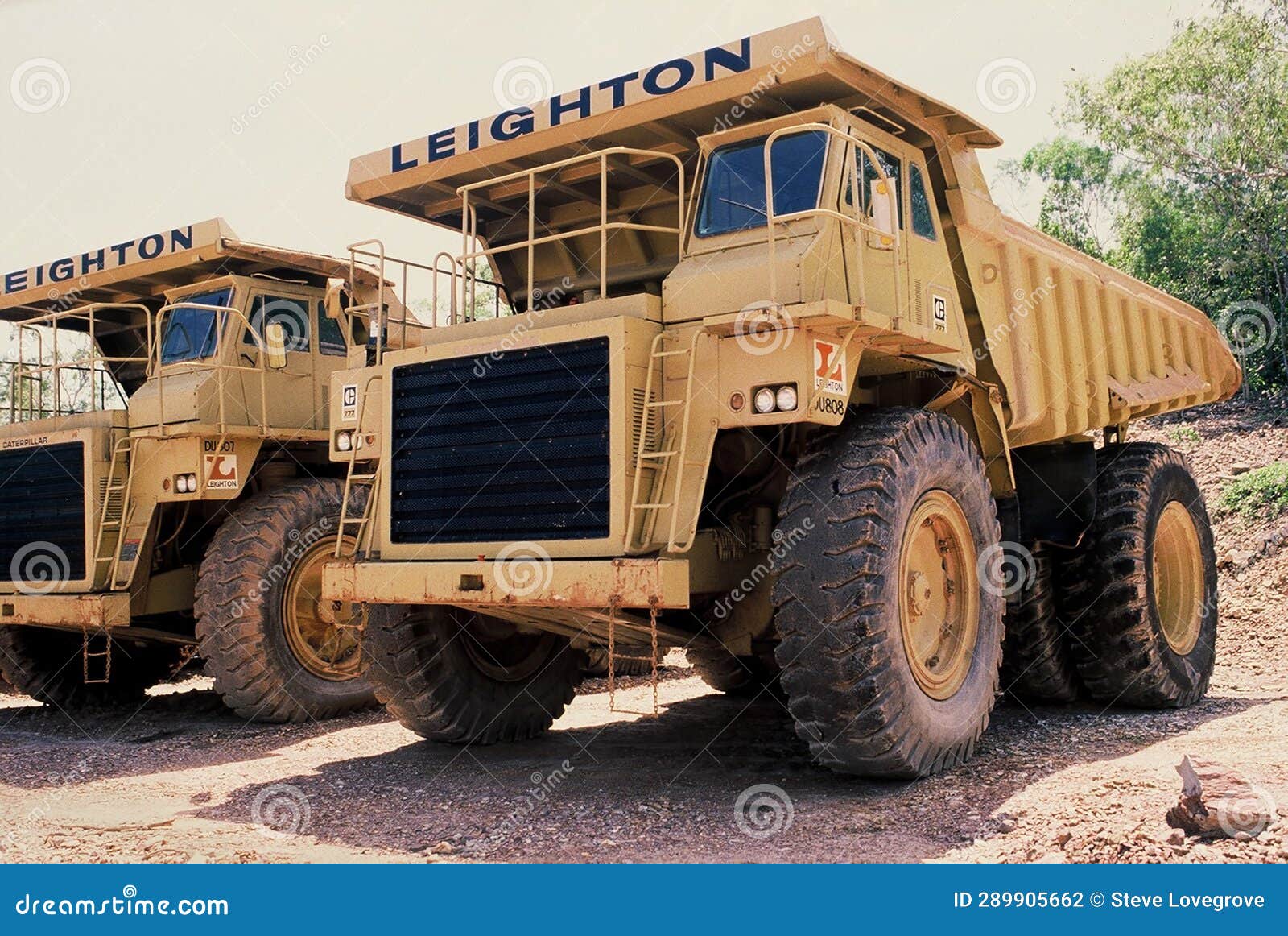 Dump Trucks Editorial Photo | CartoonDealer.com #150574289