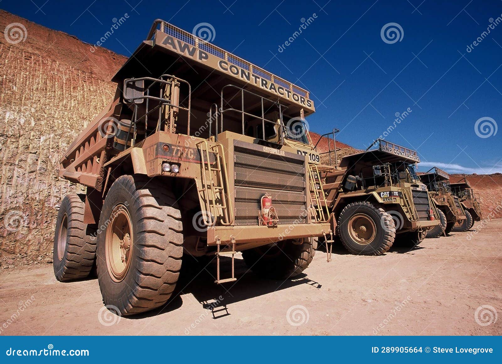 Dump Trucks Editorial Photo | CartoonDealer.com #150574289