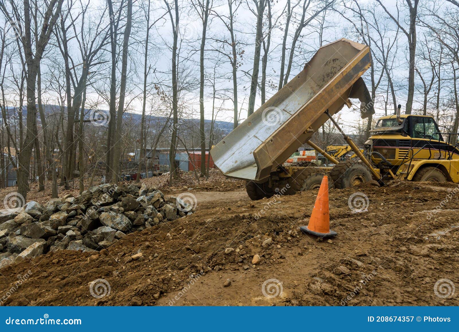 Dump Trucks Transporting for Processing Stone a Tractor Uploads with ...