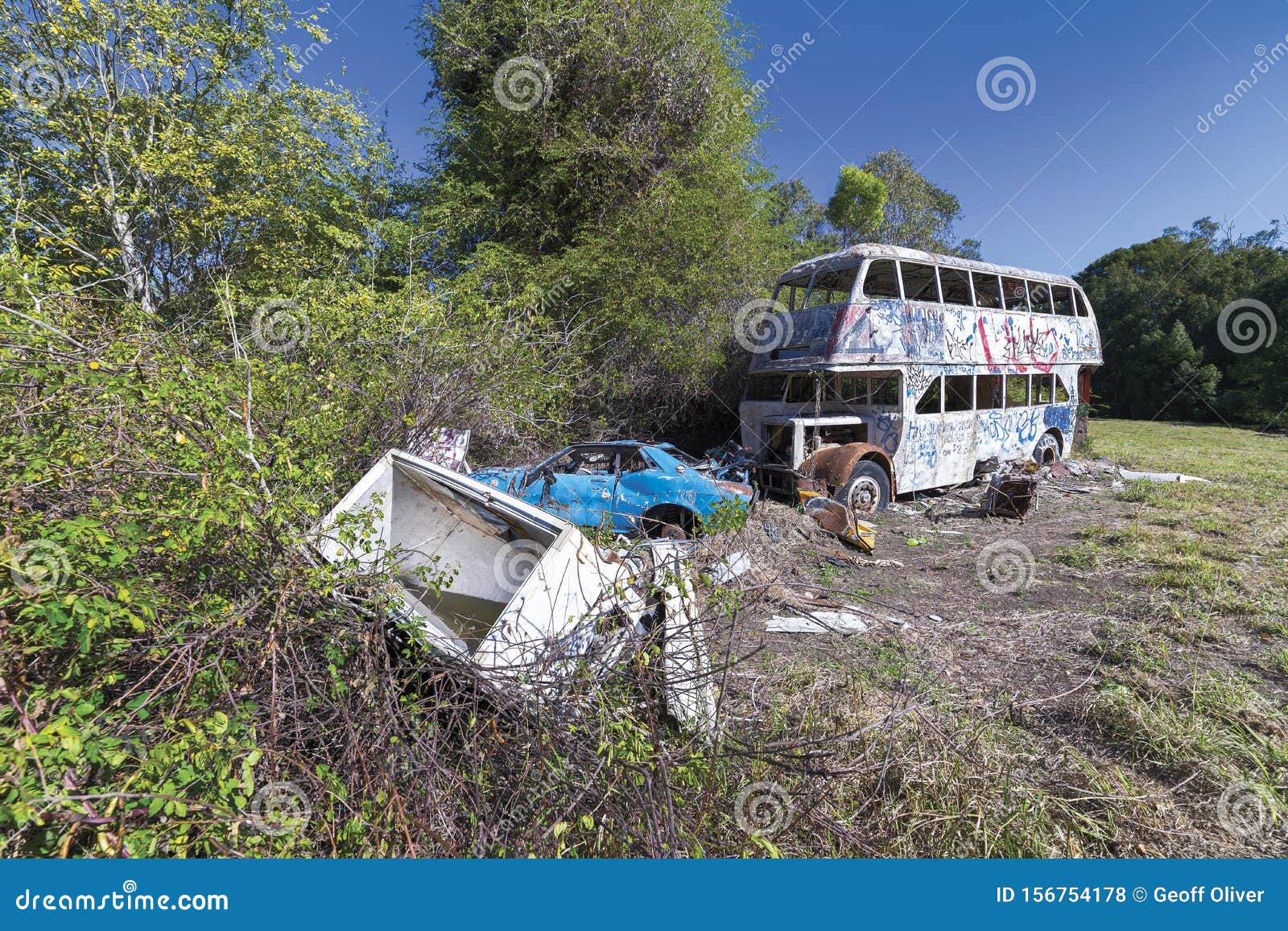 Dumped Car and Double Decker Bus Stock Photo - Image of corroded ...