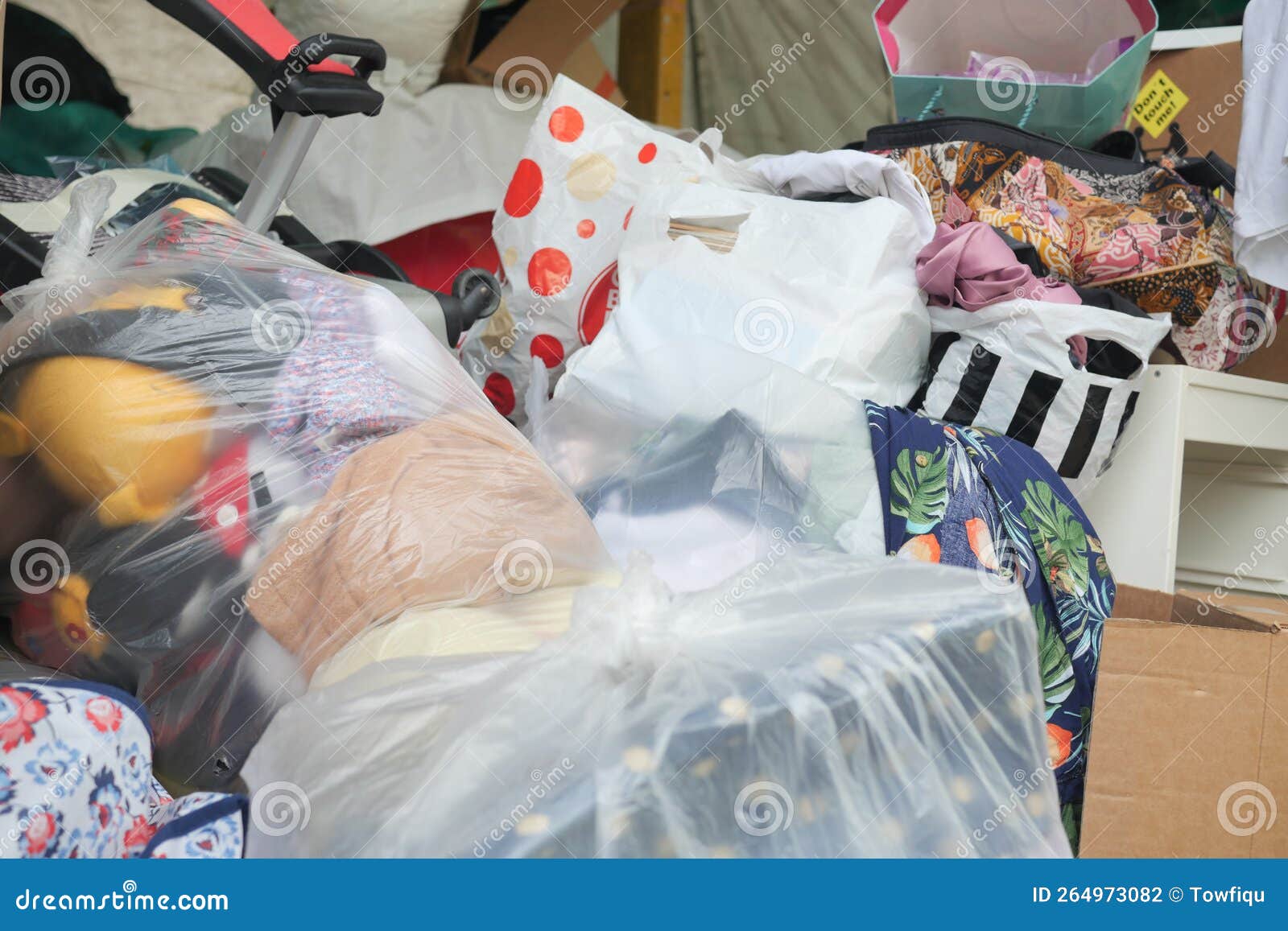 Dumped Donated Items in a Large Container Outdoor Stock Photo - Image ...