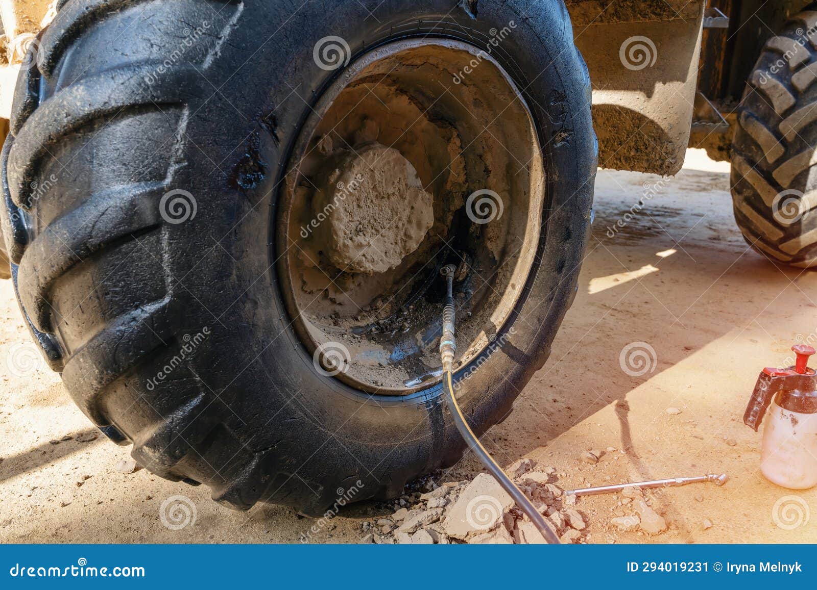 Dumper Tire Got a Puncture and is Being Repaired on the Building Site ...